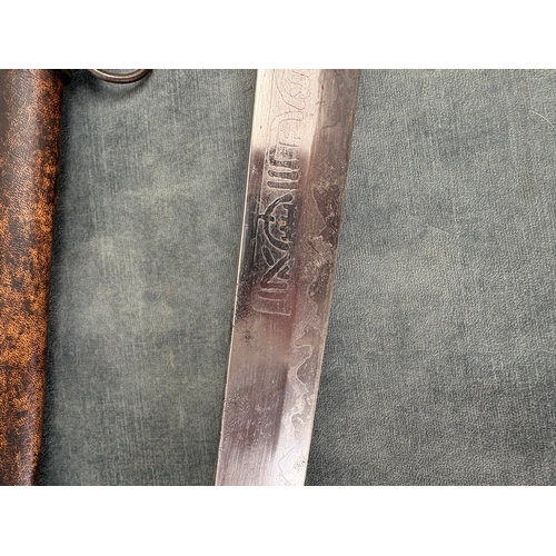 Samurai style Wakizashi, steel blade. Leather tsuba with two menuki ...