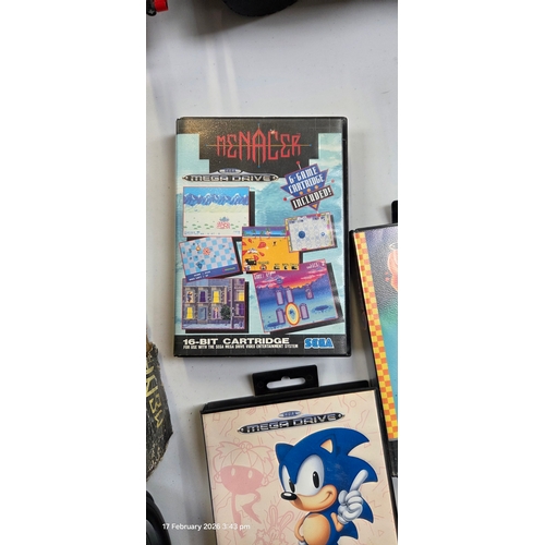 Sega Megadrive accessories and games including Menacer hand gun, Sonic ...