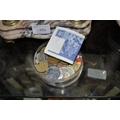 SMALL TIN OF COINS AND NOTES