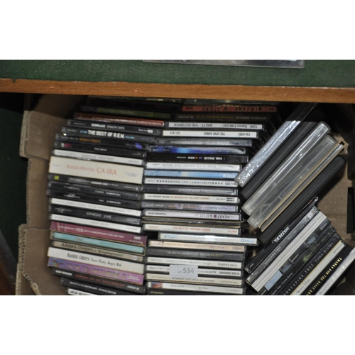 LARGE BOX OF COLLECTABLE CDS INC R.E.M. , GENESIS AND MORE