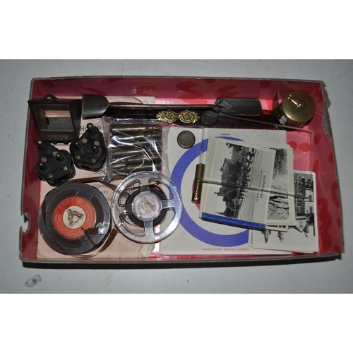 COLLECTABLES OF PHOTO REELS BAKELITE PLUGS AND USED BULLETS