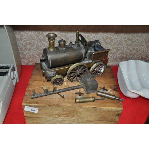 A VINTAGE COPPER AND BRASS STEAM LOCOMOTIVE