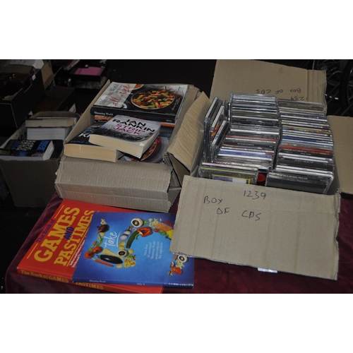 A LARGE SELECTION OF CDS AND A BOX HARDBACK AND PAPERBACK BOOKS
