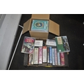 A LARGE BOX OF AUDIO BOOKS IN AUDIO CASSETTE FORMAT PLUS A SMALLER BOX