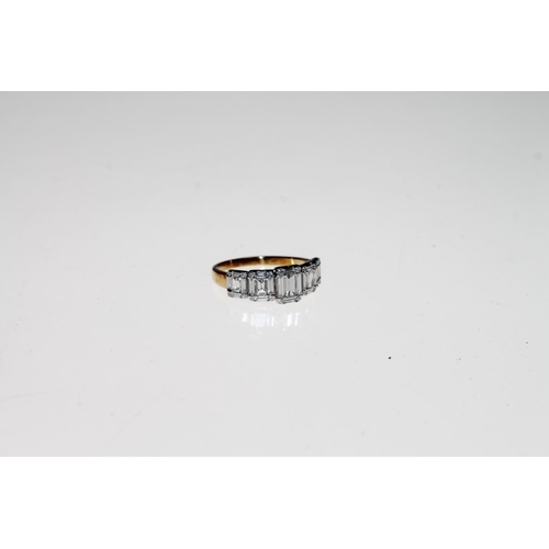 18K gold and baguette cut diamond set ring, 4.3g.