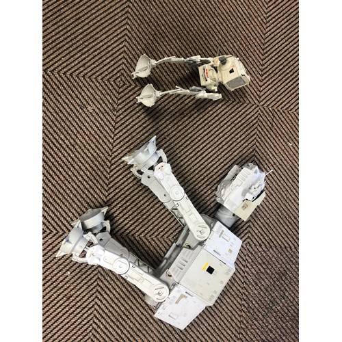 Star Wars model; AT-AT Walker; together with a Star Wars ATST
