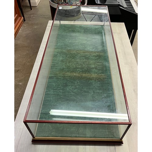 Glass table top display case, 113cm w, 22cm h, 45cm d.