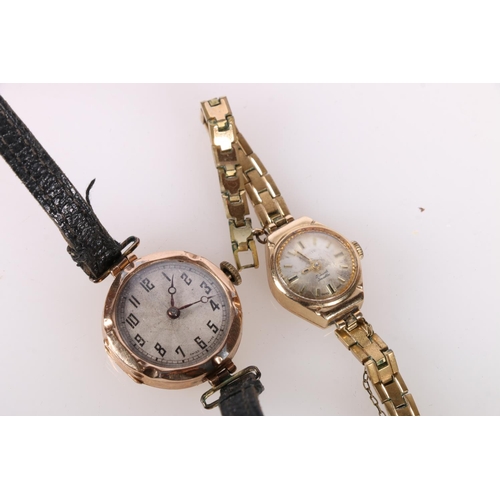 9ct gold cased ladies wristwatch with leather strap, and another 9ct ...