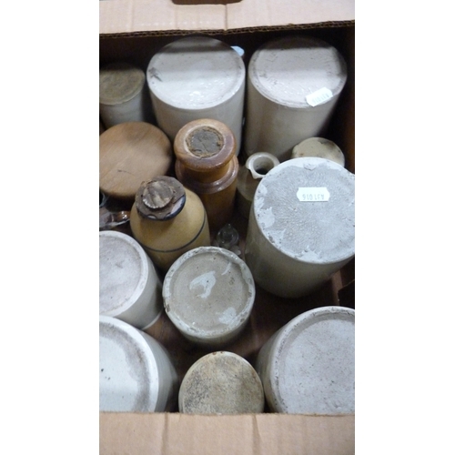 Collection of stoneware jars.