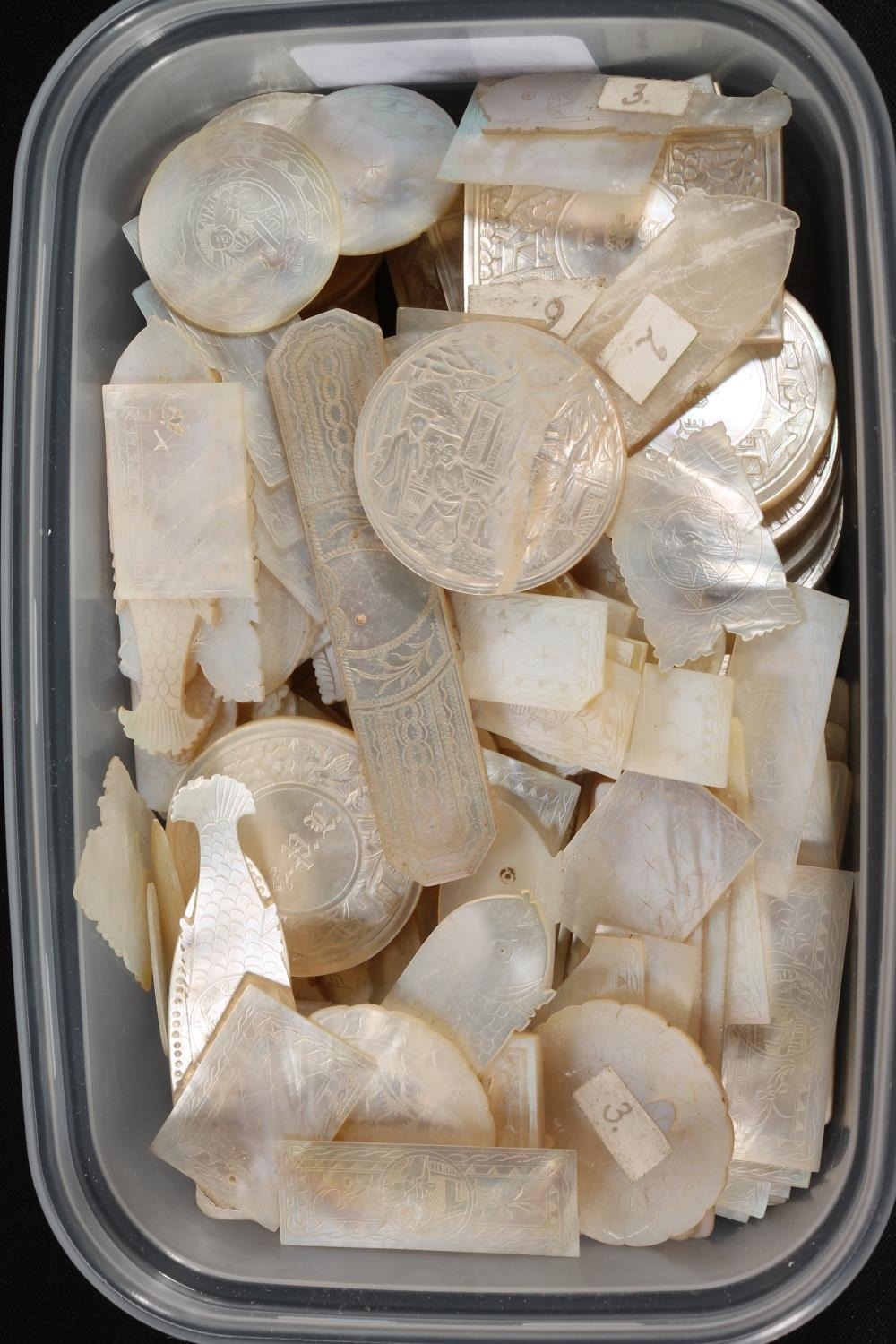 Chinese carved mother-of-pearl gaming tokens.