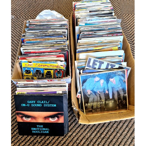 Two boxes of assorted vinyl singles