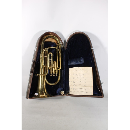 Lark brass horn tuba in fitted case.