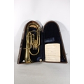 Lark brass horn tuba in fitted case.