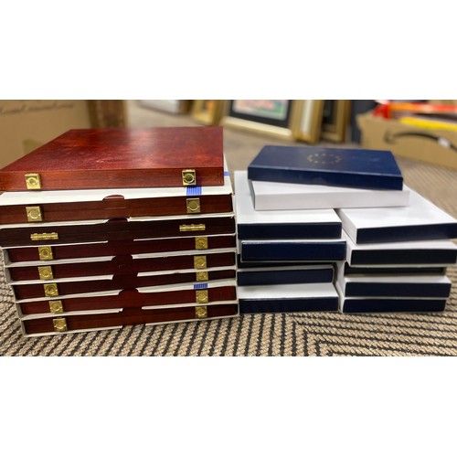 Assorted empty coin boxes