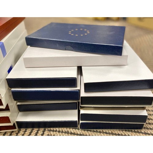 Assorted empty coin boxes