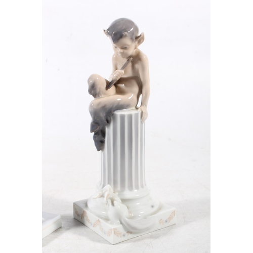 Royal Copenhagen model of a satyr and another of a mermaid.