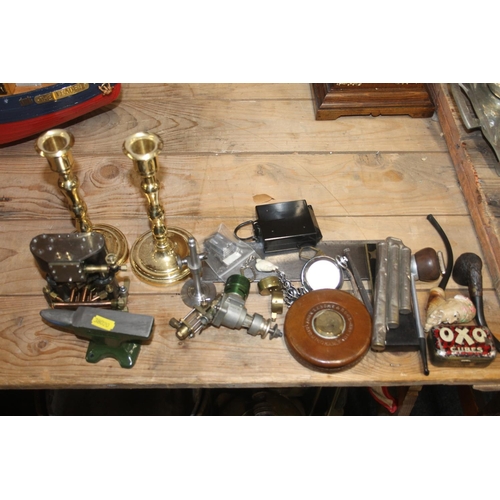 Model of a piston engine, an anvil, Meccano parts, etc.