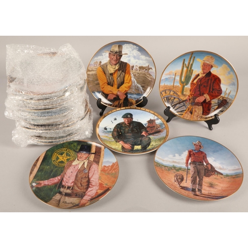 Assorted John Wayne collectors plates