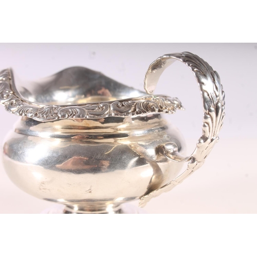Geo. IV silver cream jug, with cast shell and scroll rim, acanthus leaf ...