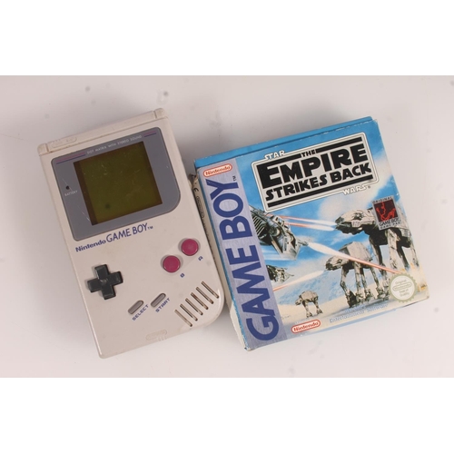 Nintendo Gameboy model no.DMG-01 and Star Wars The Empire Strikes Back ...