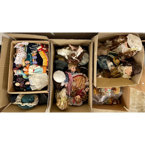 Four boxes of assorted dolls