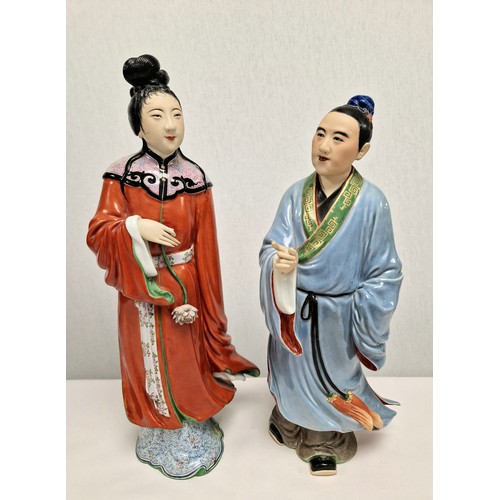 Pair of Chinese figures, character marks impressed to bases, each ...