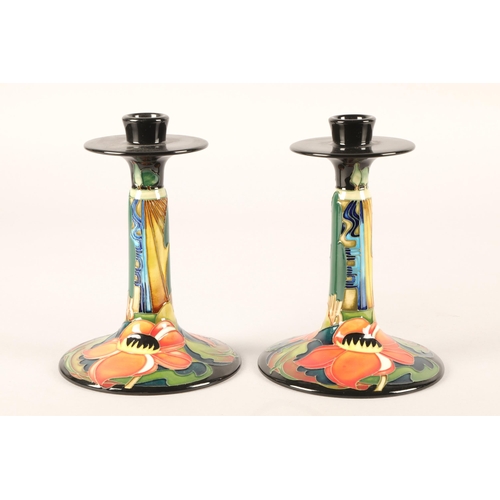 Pair of modern Moorcroft pottery candlesticks in the 'Ryden Fields ...