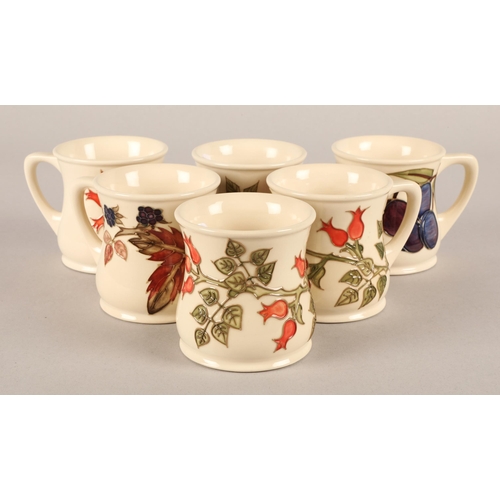 Six assorted Moorcroft mugs (6)