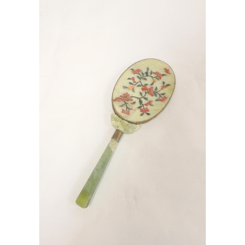 An early 20th century Chinese jade hand mirror; the oval jadeite ...