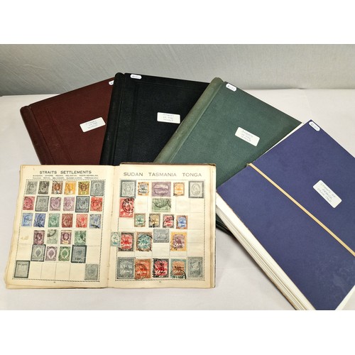 Five assorted British and world stamp albums (5)
