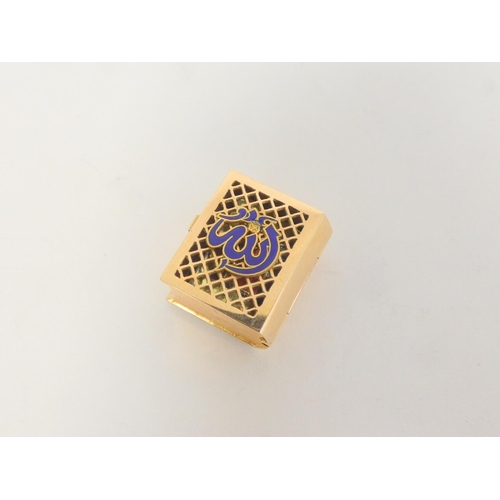 Middle Eastern gold pendant with pierced sides containing a copy of the ...