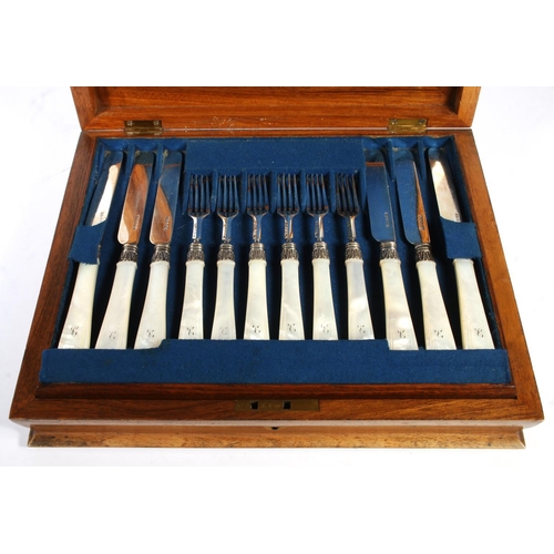Cased set of twelve silver and mother of pearl knives and forks, Henry ...