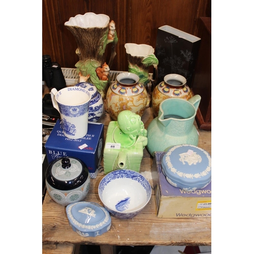 Witherensea Eastgate Pottery Fauna vase, and another, a pair of ...