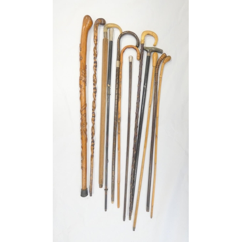 Group of antique walking canes to include an Indian or Burmese example ...