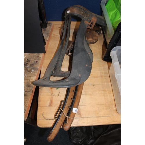 English horse saddle frame and a set of collars