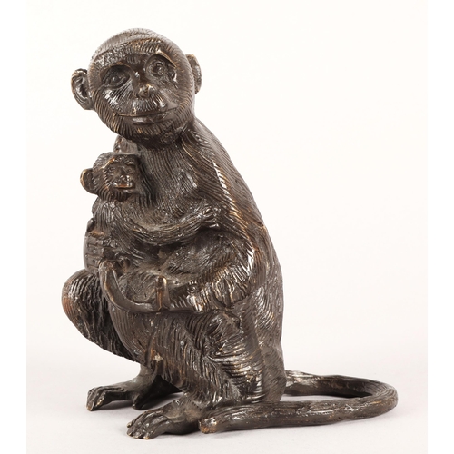 Bronze monkey figure holding its young. 18cm high