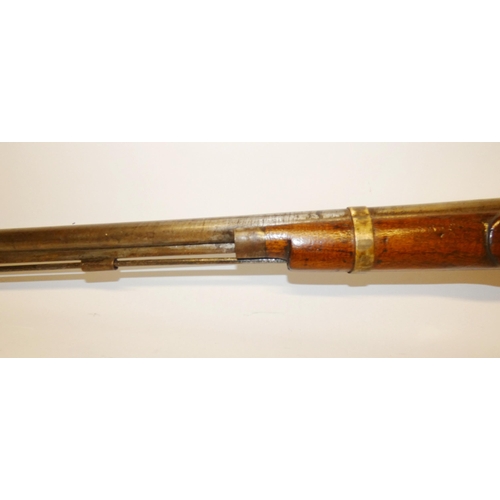Indian percussion musket, c. late 19th century, with brass mounts and ...