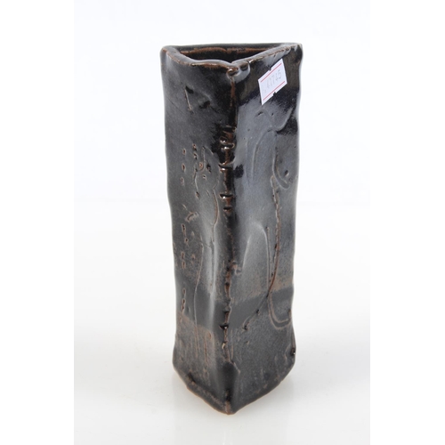Abstract pottery triangular vase, signed to base, 17cm high.