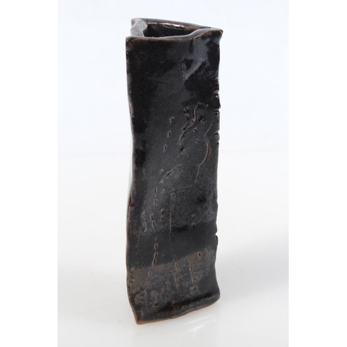 Abstract pottery triangular vase, signed to base, 17cm high.