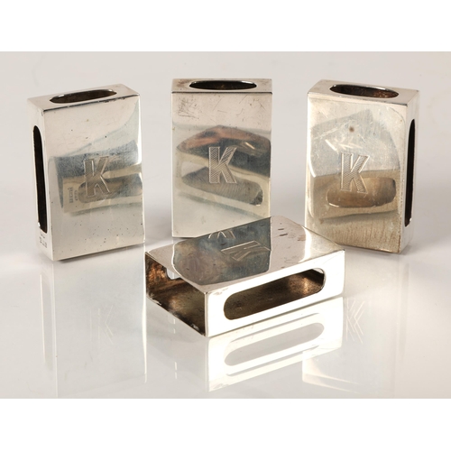 Four silver matchbox holders all inscribed with a letter 'K', assayed ...