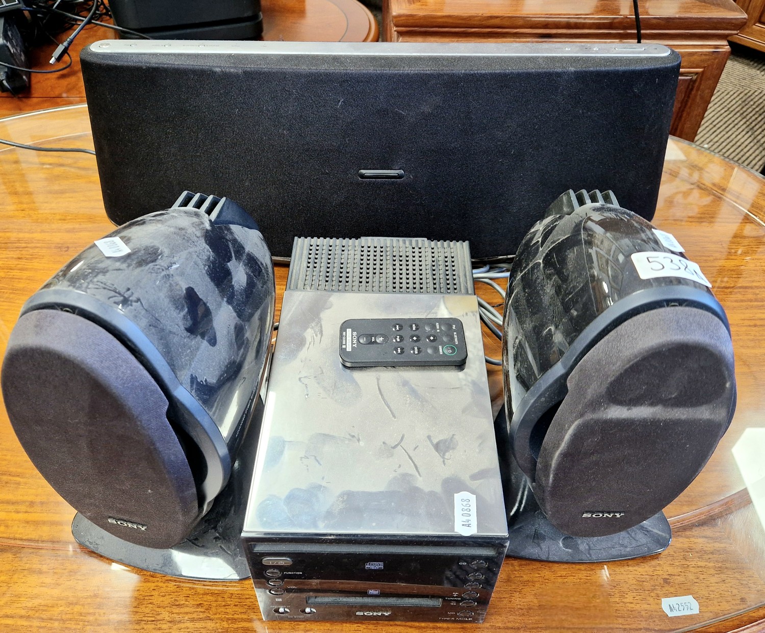 Sony music system with speakers and a Sony bluetooth speaker / iPod ...