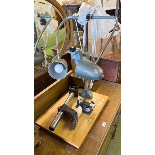 Nikon slip lamp microscope.