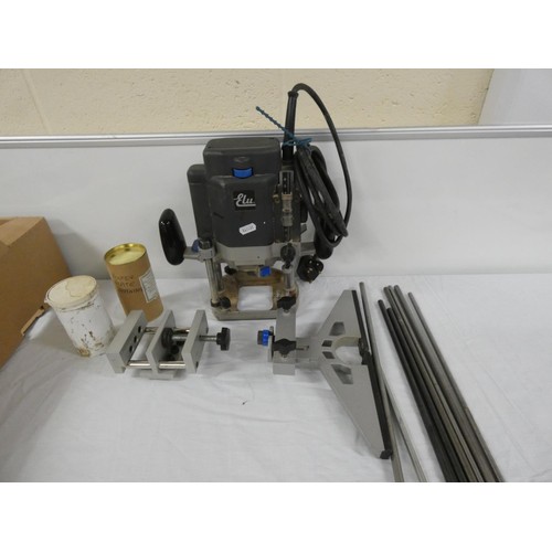 Modern Elu plunge router and sliders.