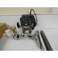 Modern Elu plunge router and sliders.