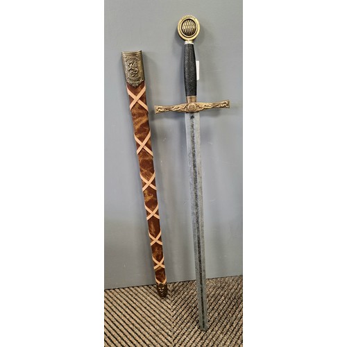 Replica Scottish Claymore sword in scabbard with Winchester gun bag