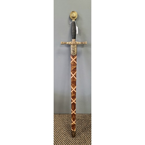 Replica Scottish Claymore sword in scabbard with Winchester gun bag