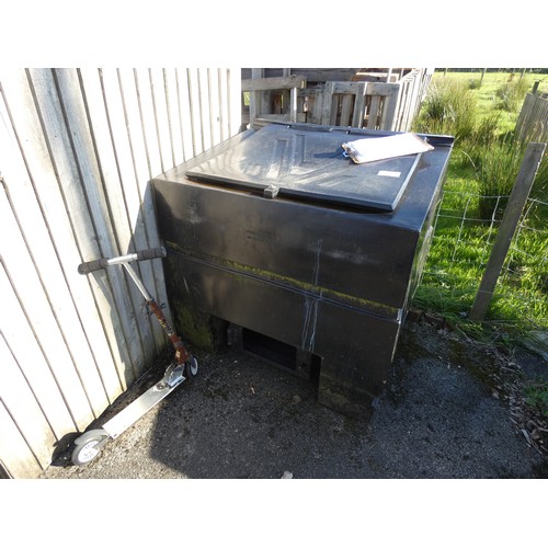 Large black plastic coal bunker.