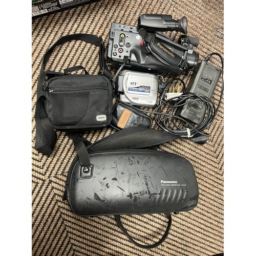 Panasonic video camera with accessories also a JVC digital video camera ...