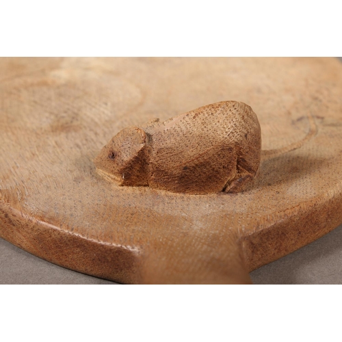 Robert Mouseman Thomson oak cheese board, of oval form with raised ...