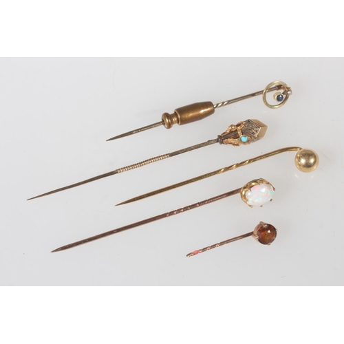 18ct yellow gold stick pin, 2g, 9ct gold stick pin and another, an opal ...